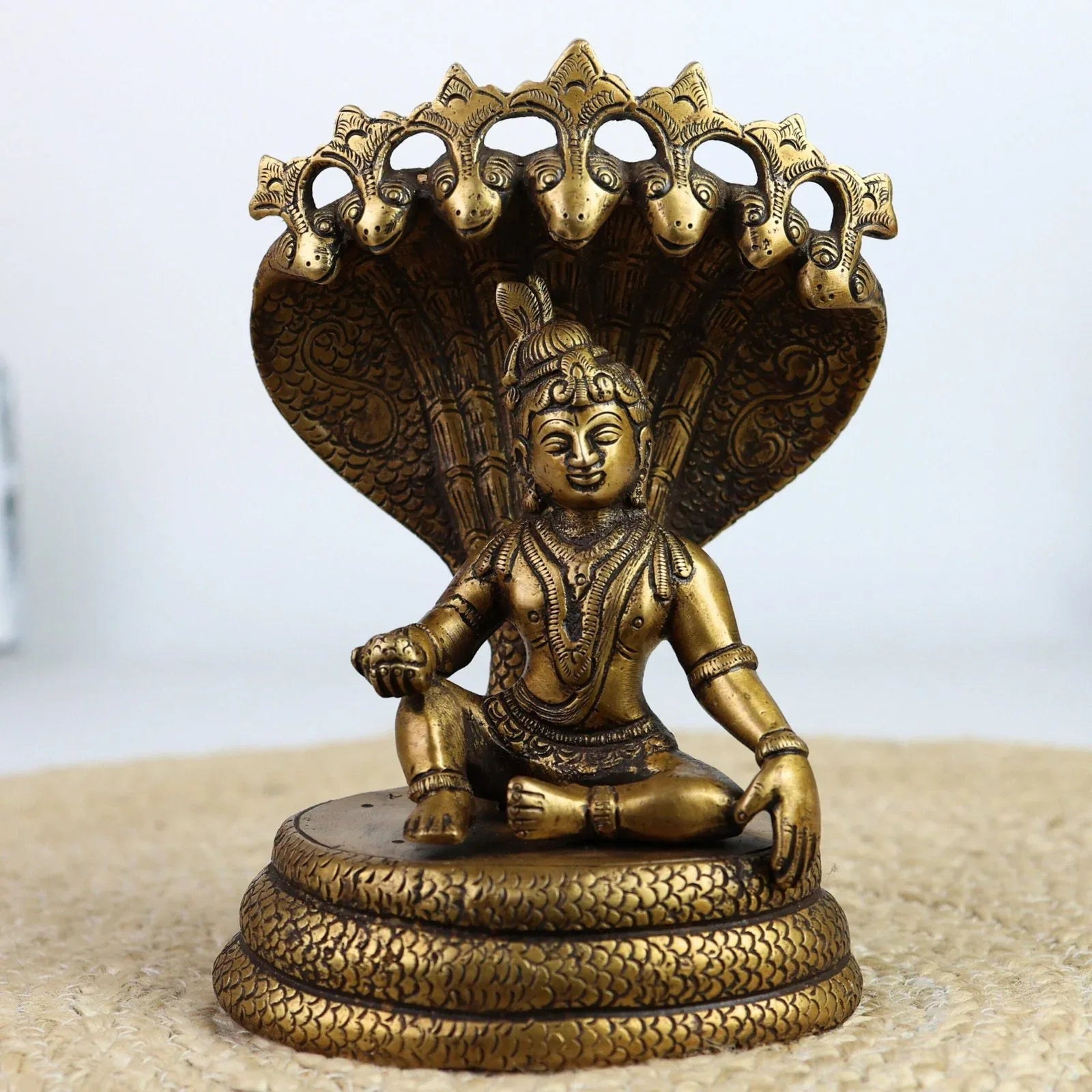 Brass Bala Krishna with 7-Headed Snake Statue – ArtyCraftz
